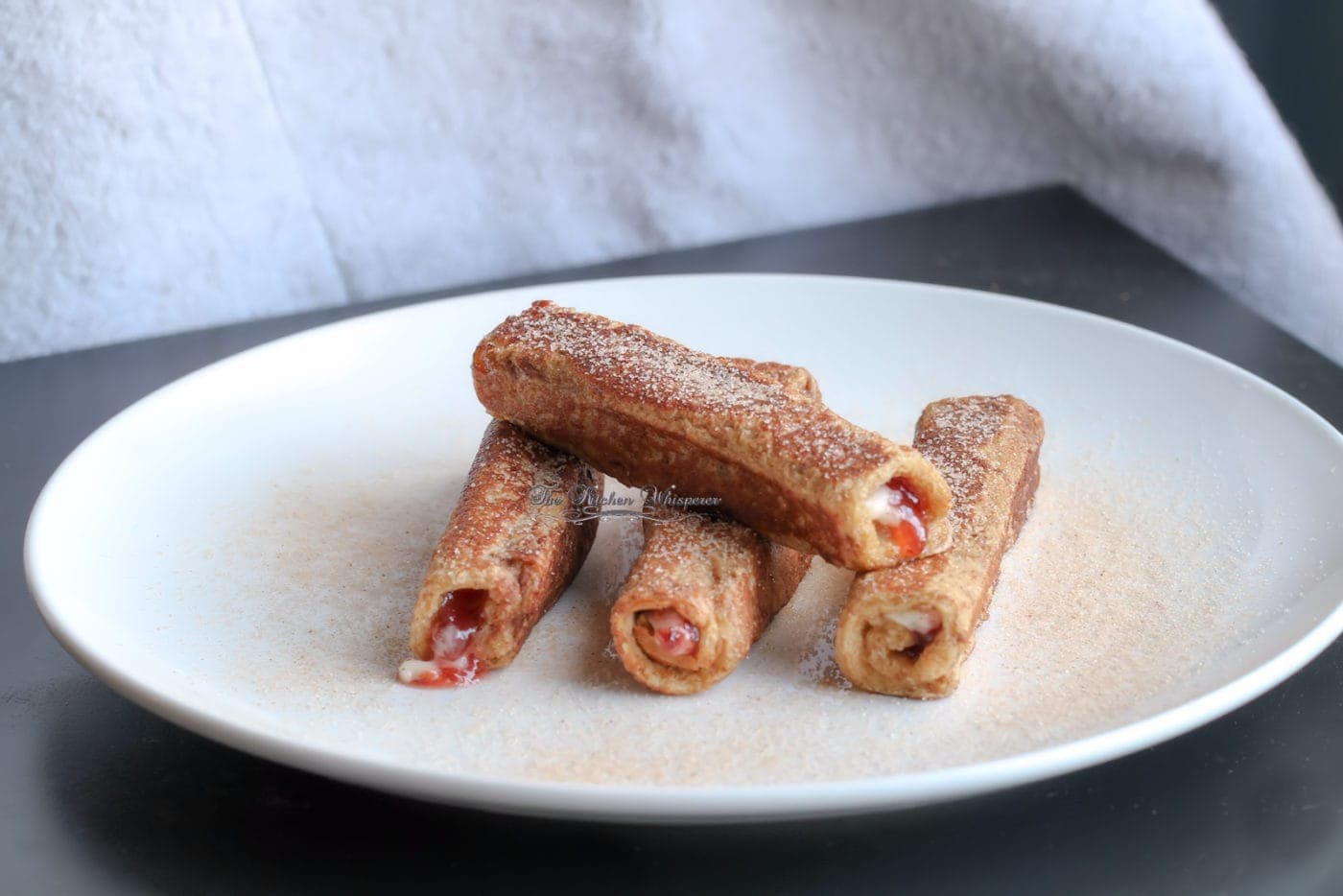 Cheesecake Berry Filled French Toast Roll Ups - The Kitchen Whisperer